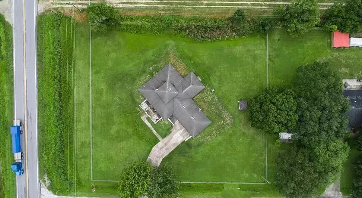 This half-buried Florida home is now on the market for $385K | Orlando ...