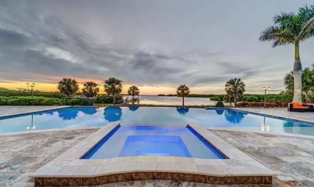 This $18 million Florida mega-mansion comes with its own private ...