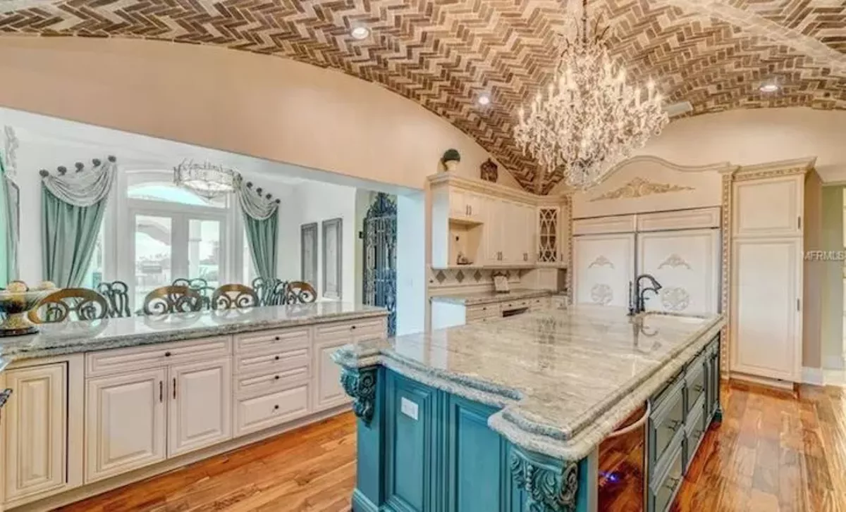 This $18 million Florida mega-mansion comes with its own private ...
