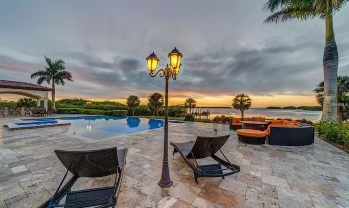 This $18 million Florida mega-mansion comes with its own private ...